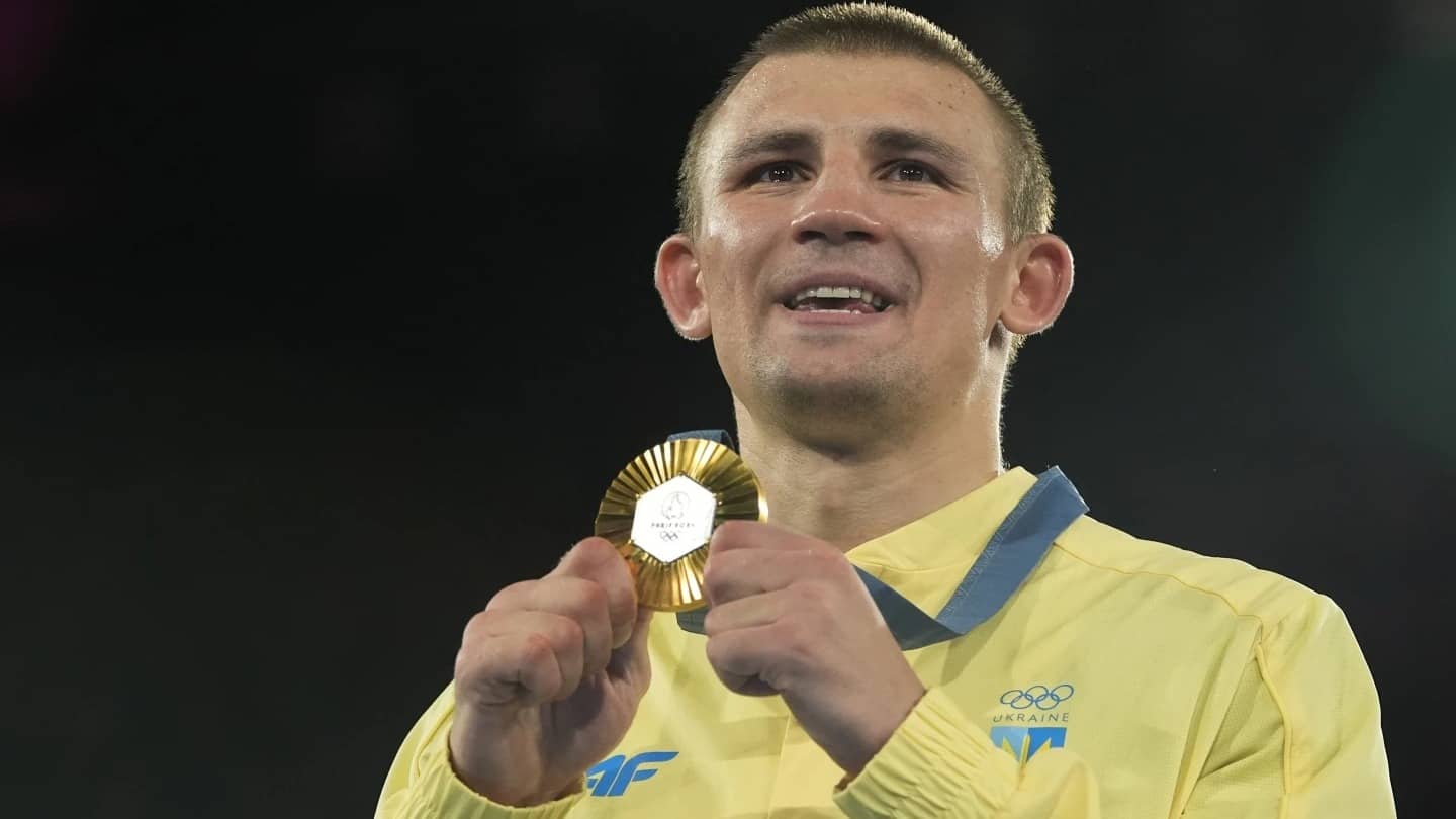 Fearsome boxer Oleksandr Khyzhniak punches his way to a Paris gold ...