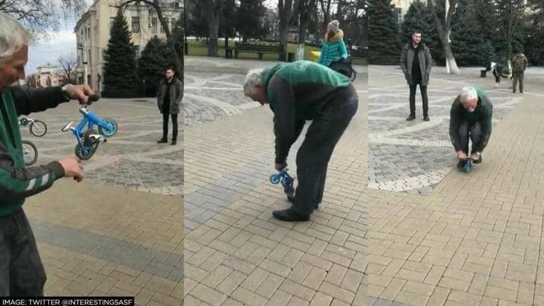 Video of elderly man enjoying ride on 'tiniest bike' goes viral ...