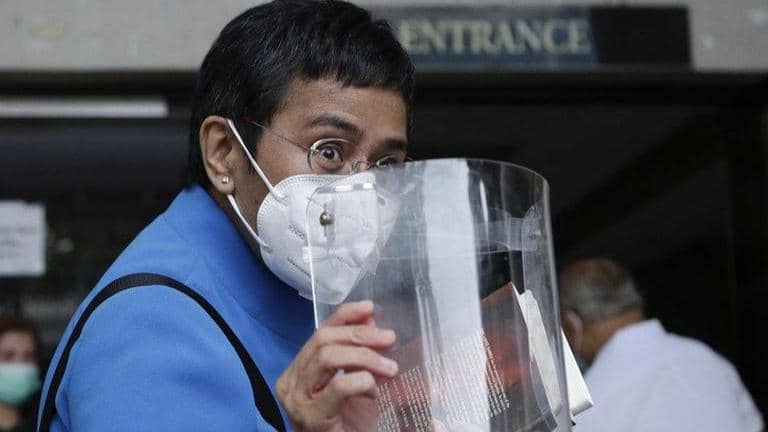 Award-winning Philippine journalist pleads not guilty to tax evasion ...