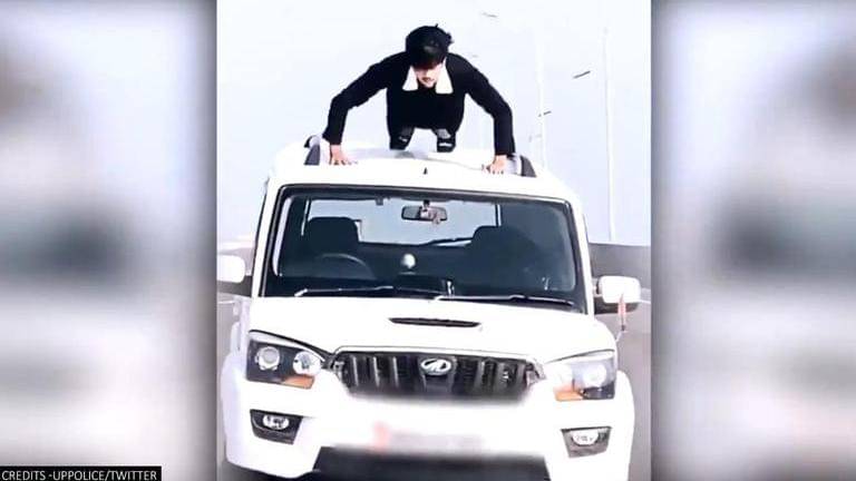 UP Police take action against man doing push-ups on moving car, share ...