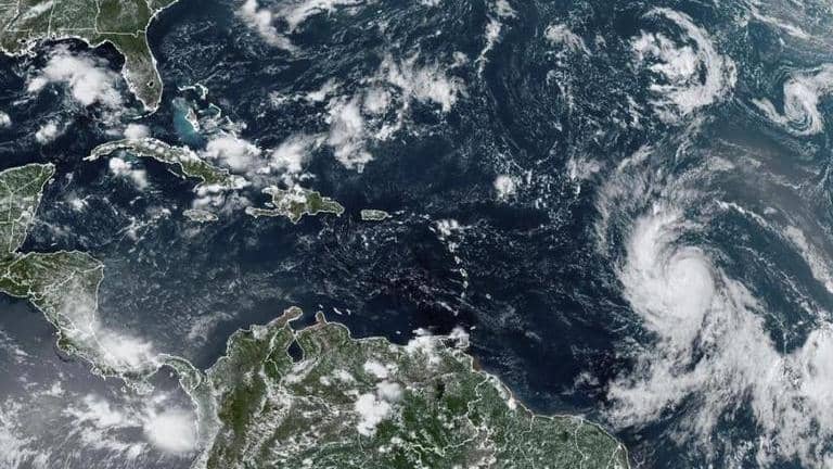 Hurricane Lee whirls through open Atlantic waters as it nears northeast ...