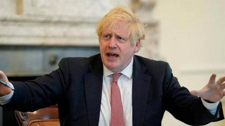 UK PM attempts to defuse fire over 'third-term' talks after massive ...