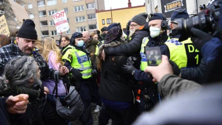 Finland, Sweden see mass protests over fresh social distancing & mask ...