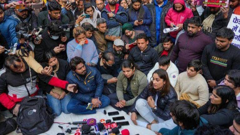 Protesting wresters wear black bands as mark of protest, call it a ...