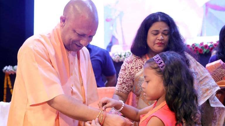 Young girls tie Rakhi to CM Yogi in Lucknow on Rakshabandhan | Republic ...