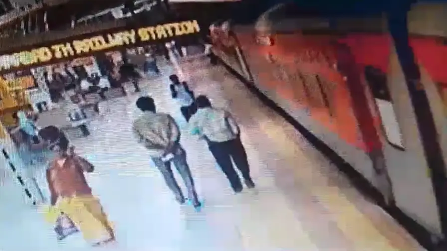 Video Miraculous Escape For Man After He Falls Between Train And