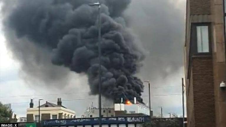 Massive inferno engulfs London's Tower Hamlets, plumes of smoke visible ...