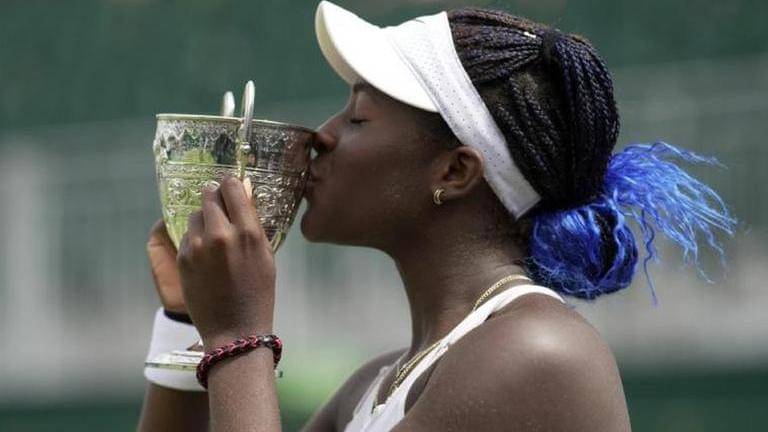 Clervie Ngounoue of the U.S. and Henry Searle of Britain win the junior ...