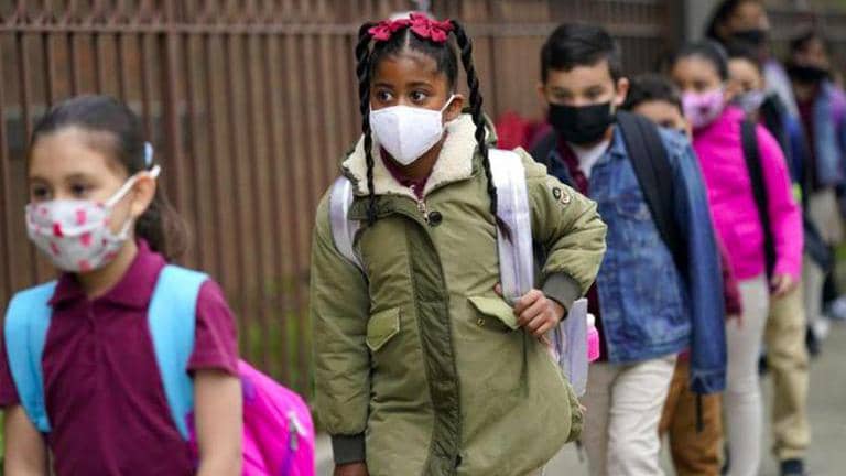 COVID-19: Masks optional for students as US schools reopen amid rising ...