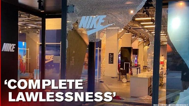 George Floyd death: Protesters ransack Nike store in Chicago, loot ...