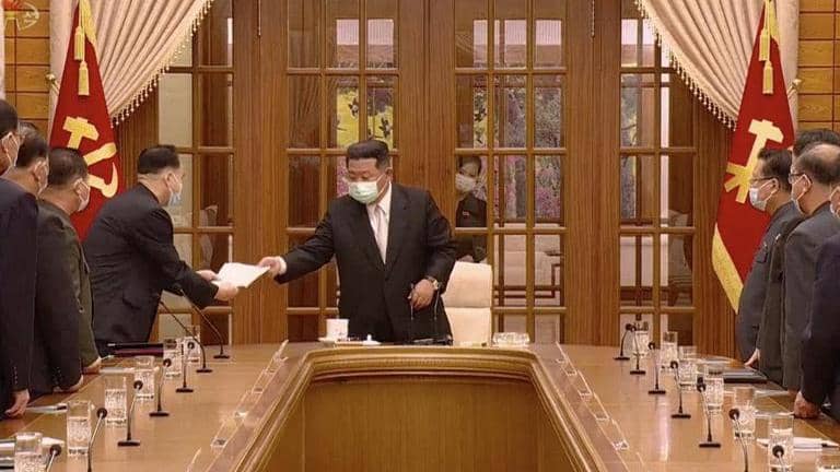North Korea's Kim Jong-un spotted wearing mask after country reports ...