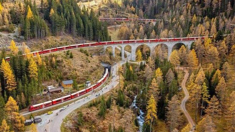 World’s longest passenger train with 100 carriages travels through ...