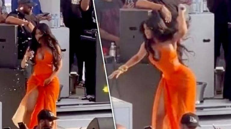 Cardi B hurls mic at concert goer in anger after they spill drink on ...