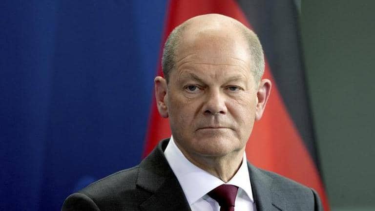 German Chancellor Olaf Scholz warns against global emergence of fossil ...