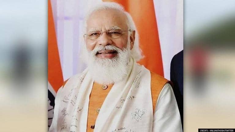 PM Modi wears 'gumcha' autographed by Indian Olympians; Netizens laud ...
