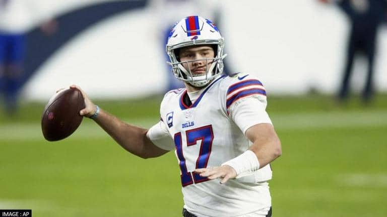 Star quarterback Josh Allen insanely leaps over defender for a first ...