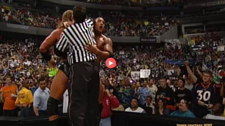 The Rock does double 'Rock Bottom' on Triple H, Shane McMahon at WWE Backlash 2000: Watch ...