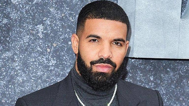 Drake loses his cool after fan throws vape at him during concert ...