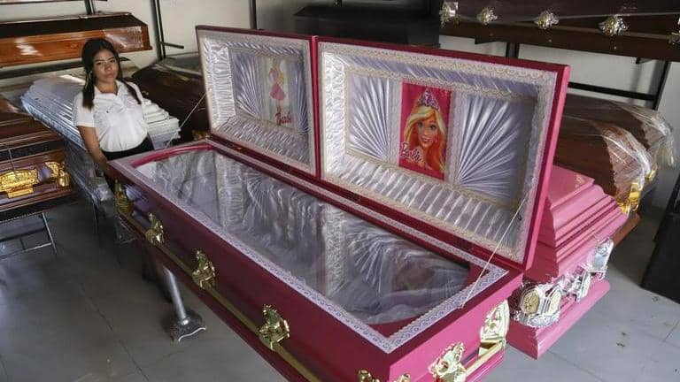 A funeral home in El Salvador offers pink metal coffins with Barbie ...