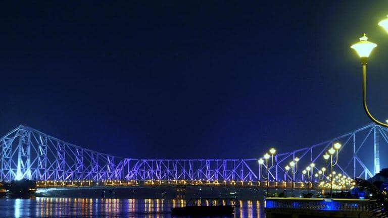 Howrah Bridge among iconic Kolkata buildings illuminated in blue to ...