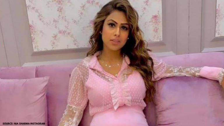 Nia Sharma turns Barbie with LED goggles on, says '90’s won’t go out of ...