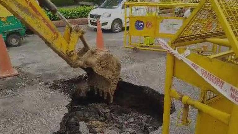 Road caves-in at C-Hexagon near Delhi's India Gate after record ...