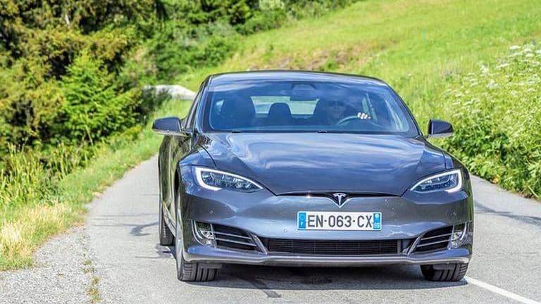 Tesla directors to return $735 million as settlement for excess ...