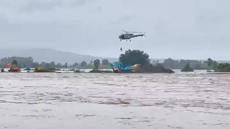 Six people stranded atop earthmover in rain-hit Telangana rescued by ...