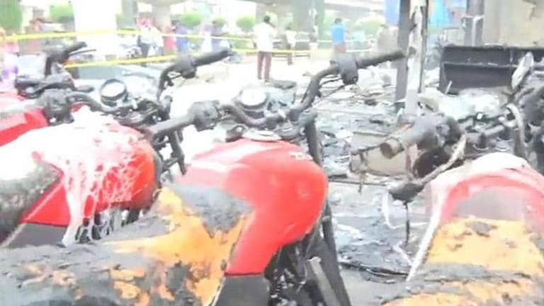 Over 400 motorbikes gutted in fire at a bike showroom in Vijayawada ...