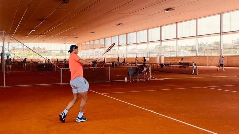 Ecstatic Rafael Nadal resumes training after weeks 'without stepping on ...