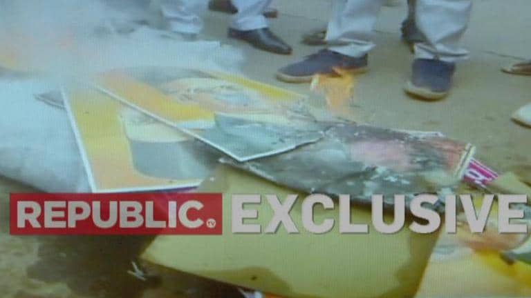 Karnataka: 8 Congress workers booked for burning VD Savarkar's posters ...