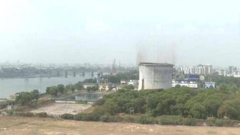Surat's old cooling tower of Utran power house reduced to ashes in mere ...