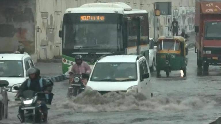 Delhi grapples with waterlogging and traffic chaos as heavy rain hits ...