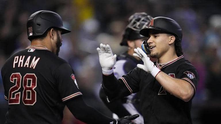 Diamondbacks overcome early 4-run deficit to beat Rockies 12-5 ...