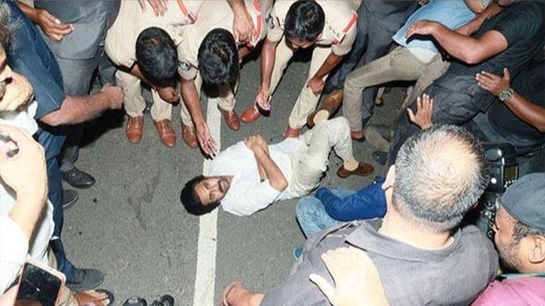 Stopped at Andhra border, JSP chief Pawan Kalyan lies down on road ...
